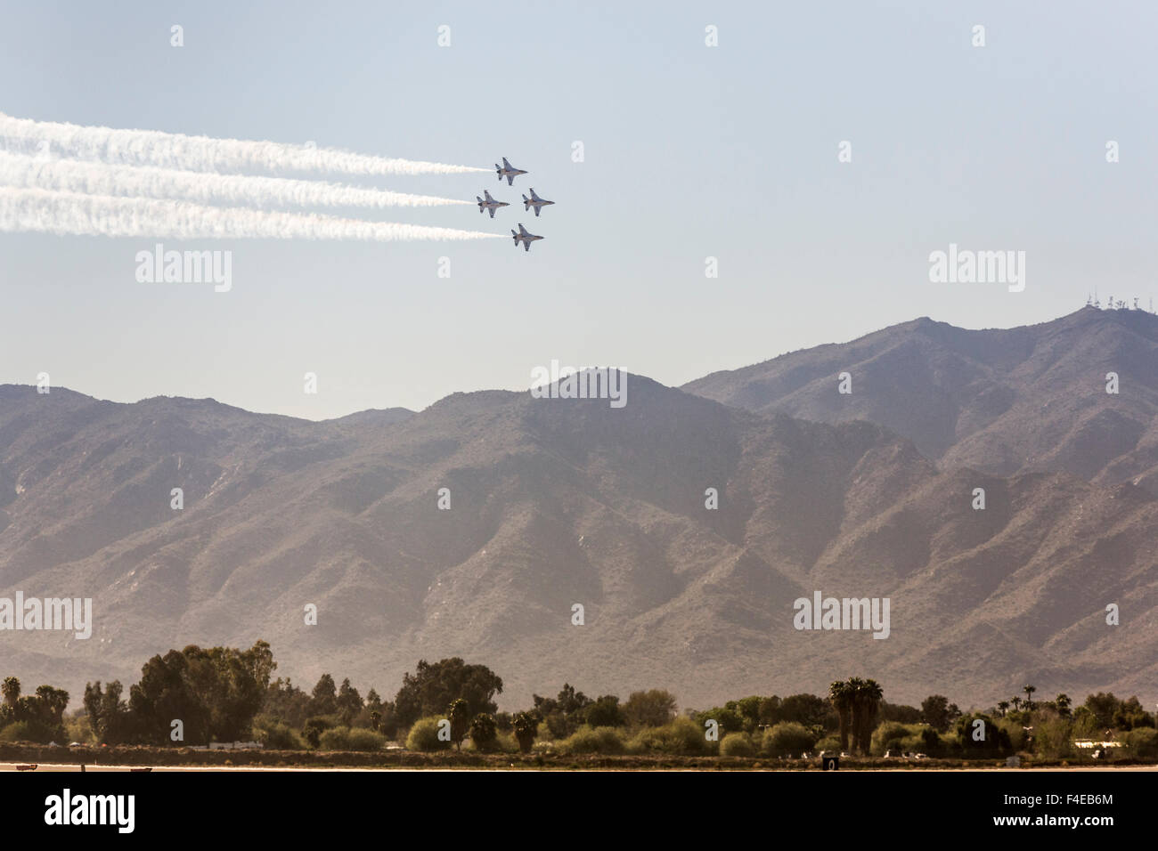 USA, Arizona, Glendale, Luke Air Force Base. Four F-16 Thunderbirds fly ...
