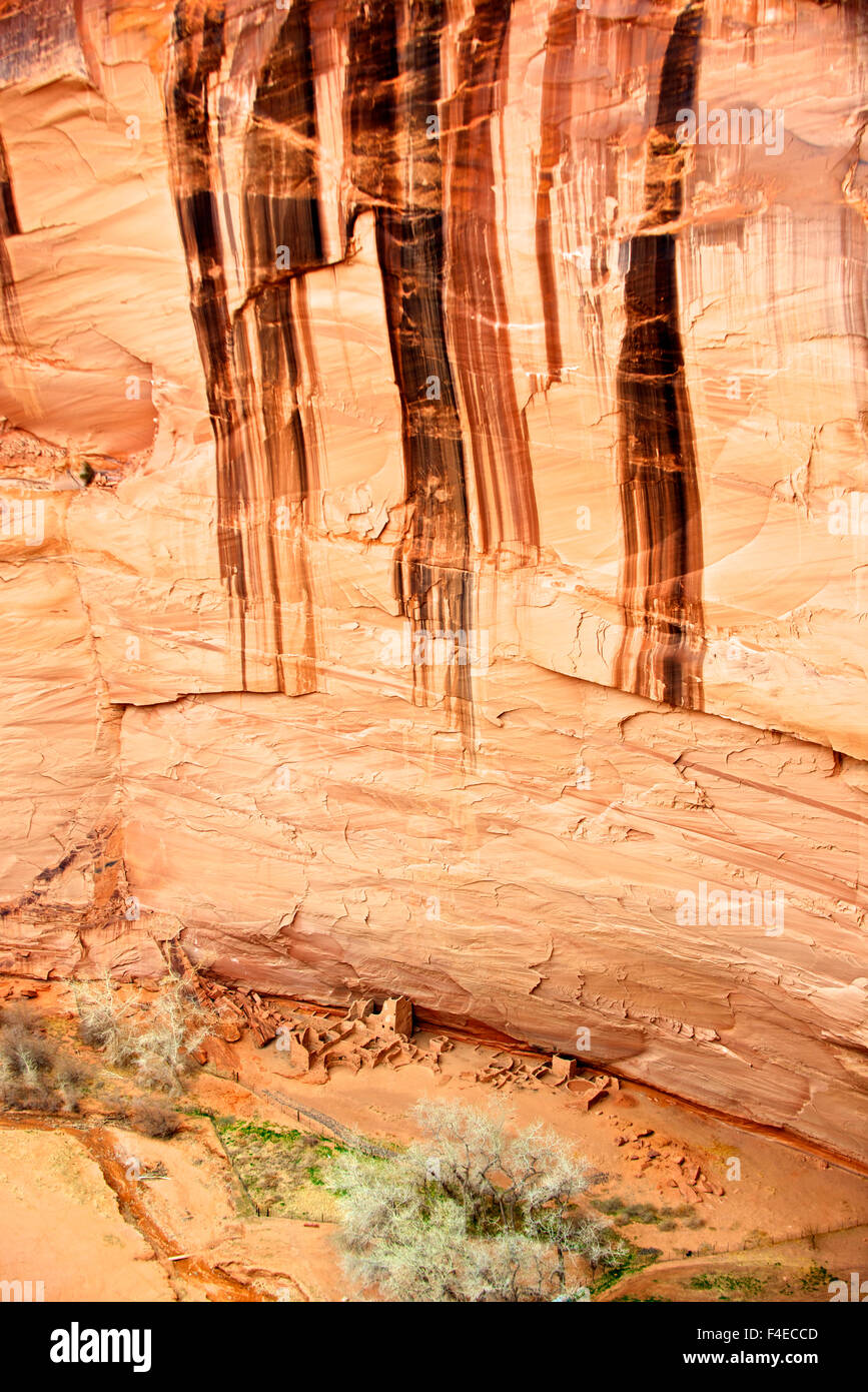 Desert patina paints the rock walls above Antelope House, and ancient ...