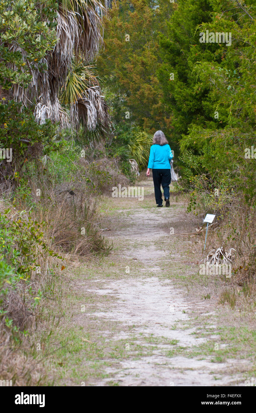 USA, Florida. Woman Hiker on Cedar Key Railroad Trestle Nature Trail ...