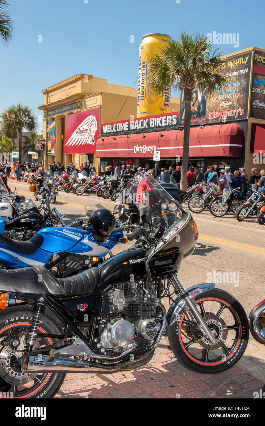 USA, Florida, Daytona Beach, Bike Week, bikers riding down Main Street ...