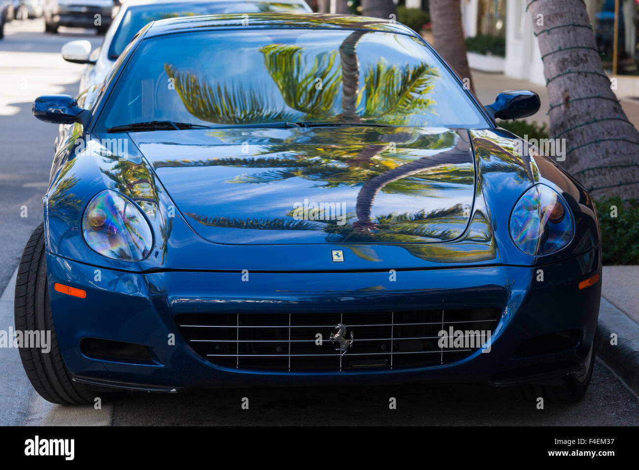 USA, Florida, Palm Beach, Worth Avenue, palm tree reflected in Ferrari ...