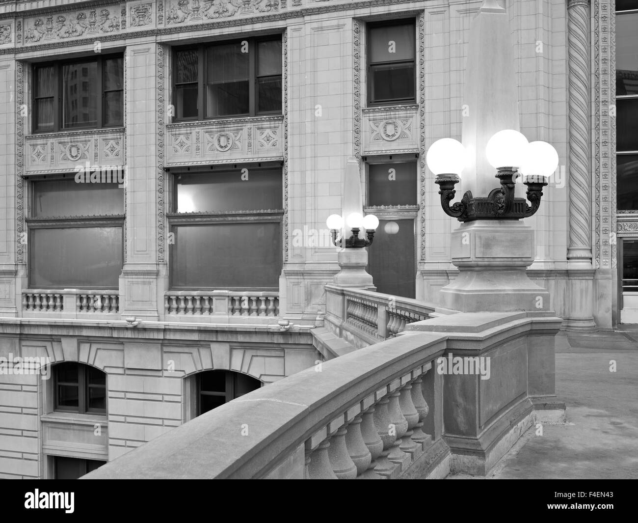 USA, Illinois, downtown Chicago, Sandstone rail with two lamp posts ...