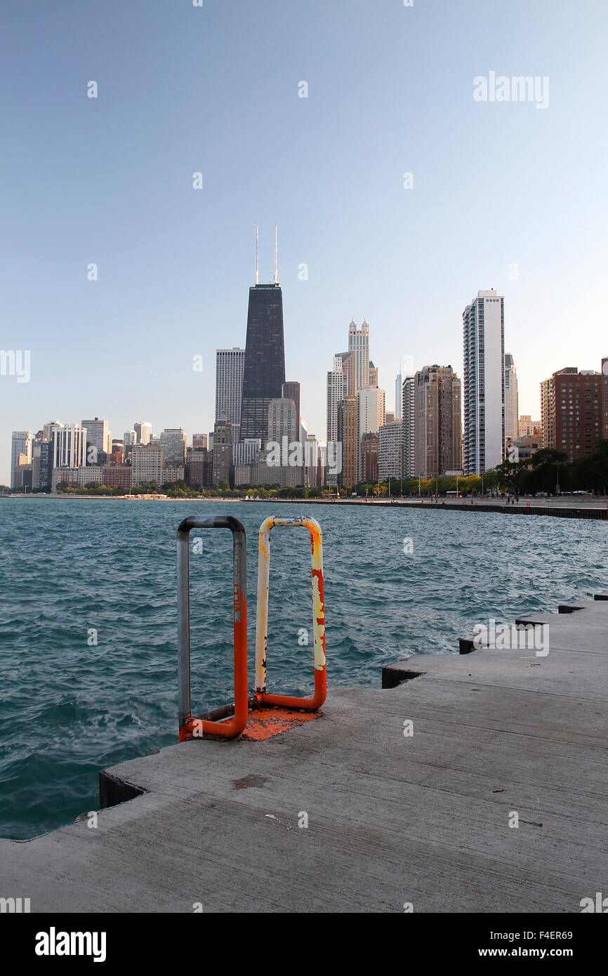 A weathered metal structure used to climb from a concrete platform into ...