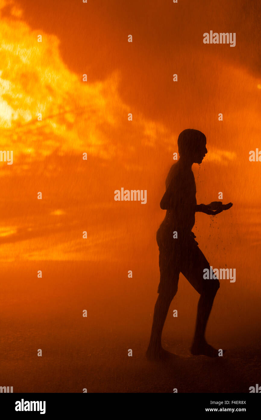 Massachusetts, Cape Ann, Rockport, Fourth of July Bonfire, silhouettes ...