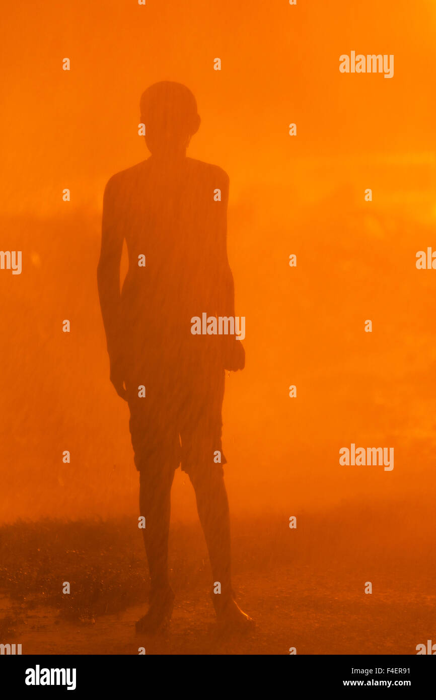 Massachusetts, Cape Ann, Rockport, Fourth of July Bonfire, silhouettes ...