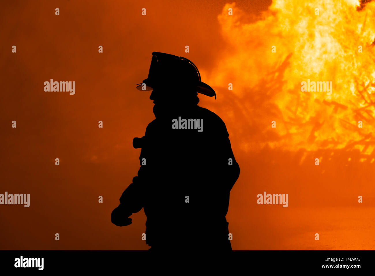 Massachusetts, Cape Ann, Rockport, Fourth of July Bonfire, silhouettes ...