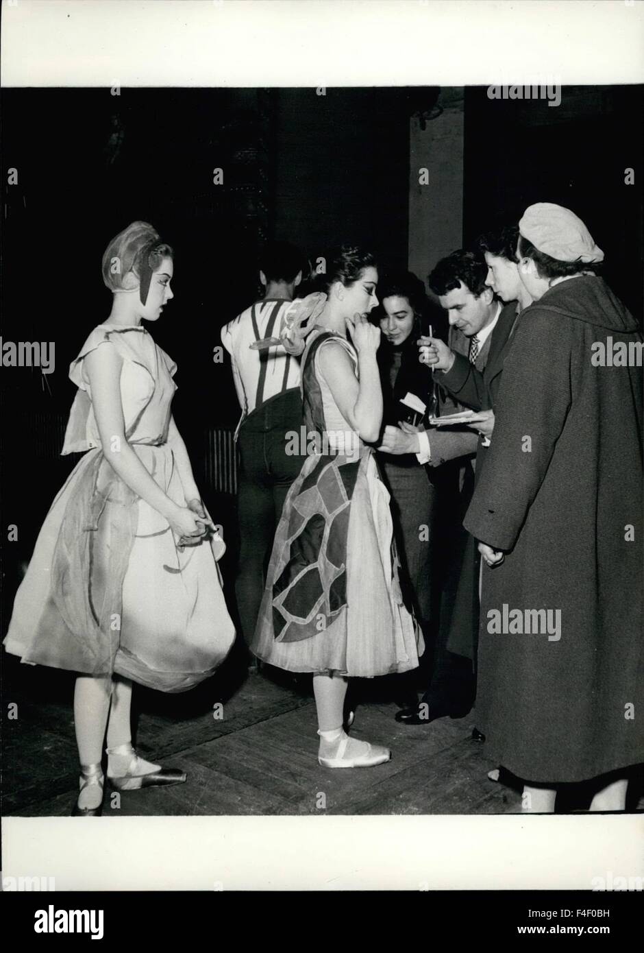 1969- Susan Alexander looks on as reporters crowd around ballerina Anne ...