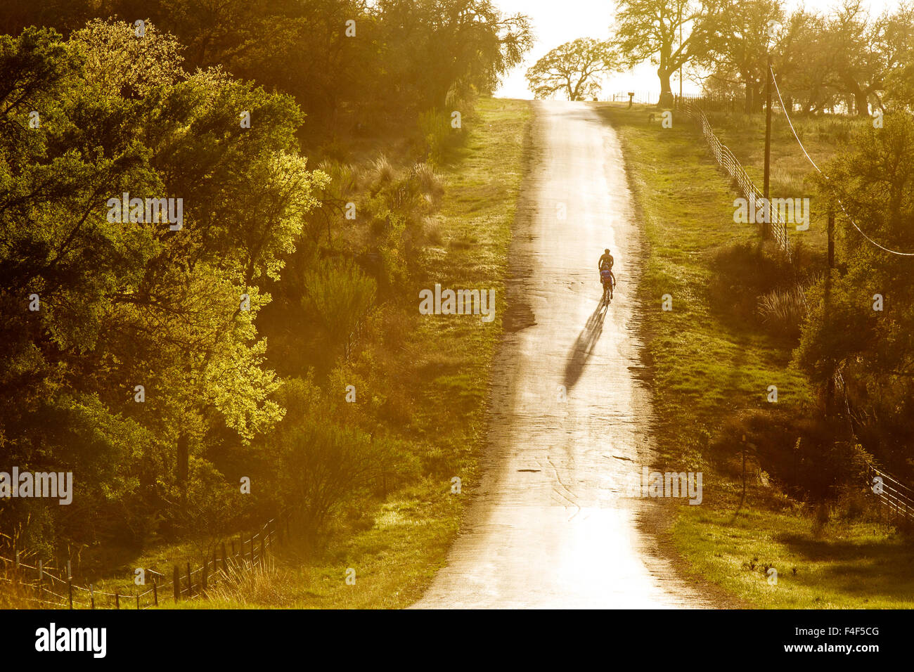 Road cycling on empty roads in Texas Hill Country near Fredericksburg ...