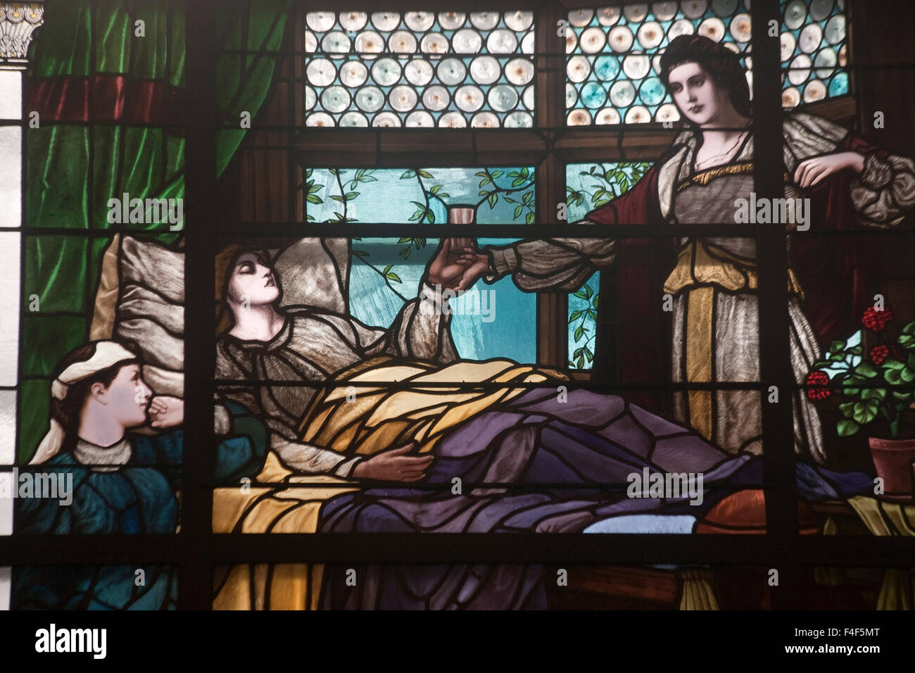 Doing Kindness to Others is the theme of this stained glass window in ...
