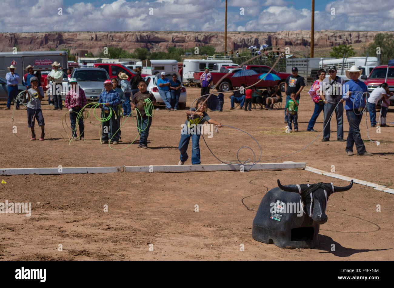 USA, Utah, Bluff. Girl throws rope in Dummy roping competition at the ...