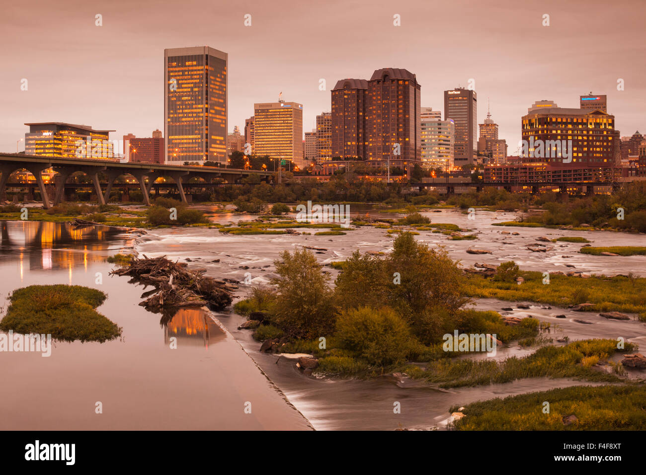 USA, Virginia, Richmond, skyline along James River, dusk Stock Photo ...