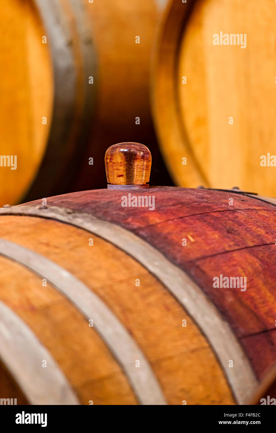 USA, Washington, Leavenworth. Glass bung in barrel cellar Stock Photo ...