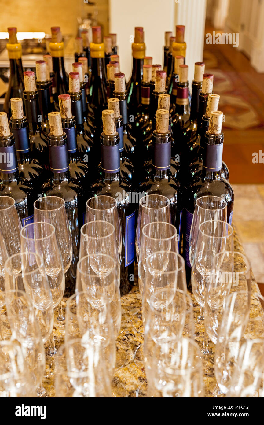 USA, Washington, Seattle. Wine bottles at a banquet ready to be poured ...