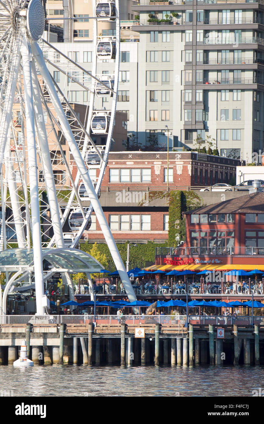 USA, Washington State, Seattle. Waterfront condos, Ferris wheel ...