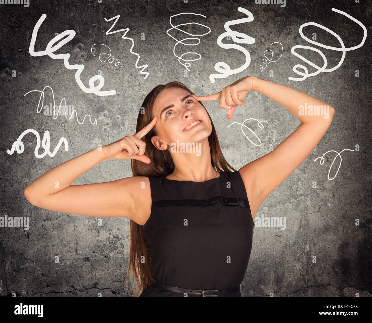 Happy young lady looking up Stock Photo - Alamy
