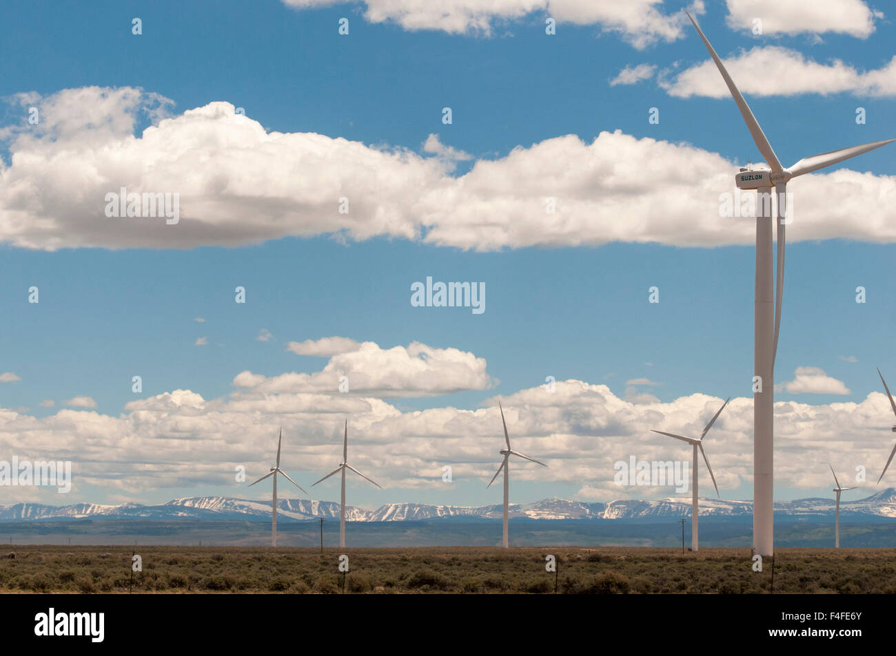 USA, Wyoming. Wind farm between Rocky Mountains and interstate Stock ...