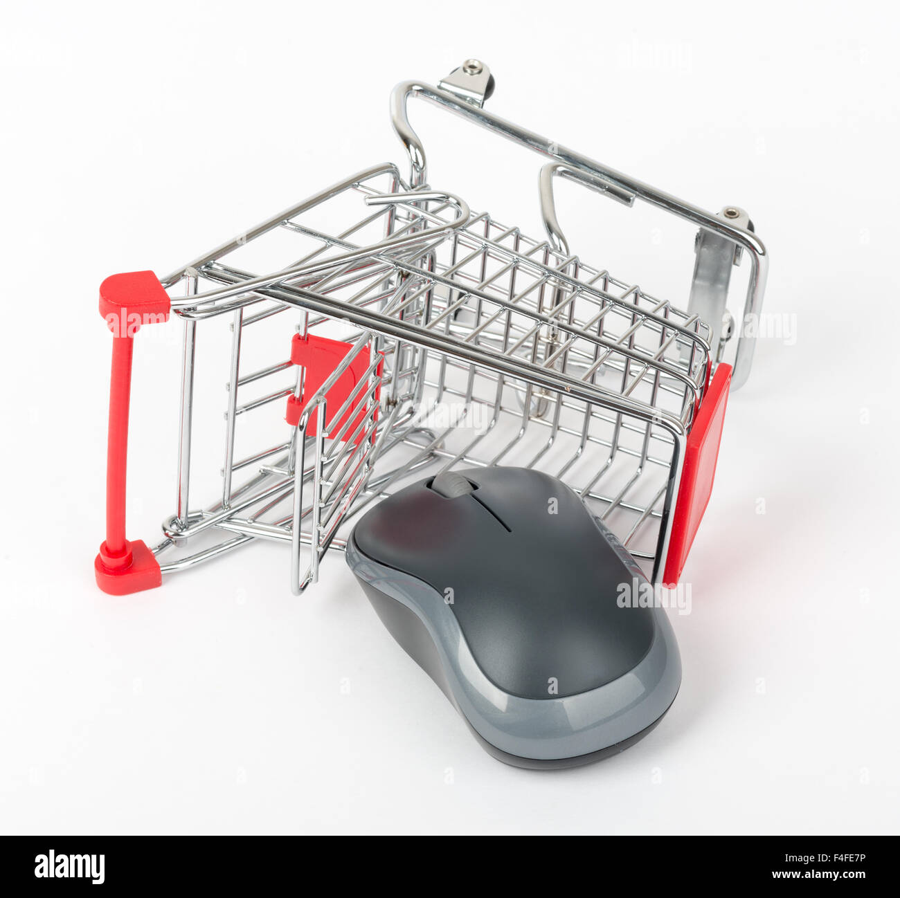 Computer mouse in shopping cart on white Stock Photo - Alamy