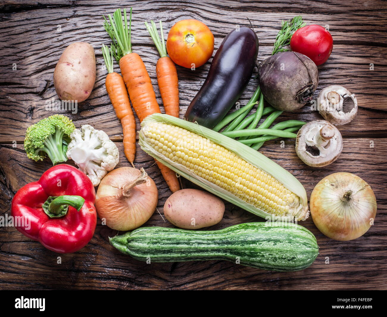 Fresh organic vegetables on the wooden table. Top view Stock Photo - Alamy