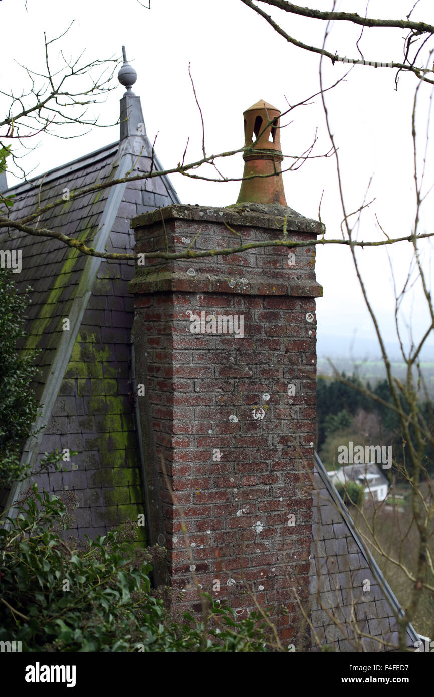 It's a photo of a chimney that is on the roof of a house in Normandy ...