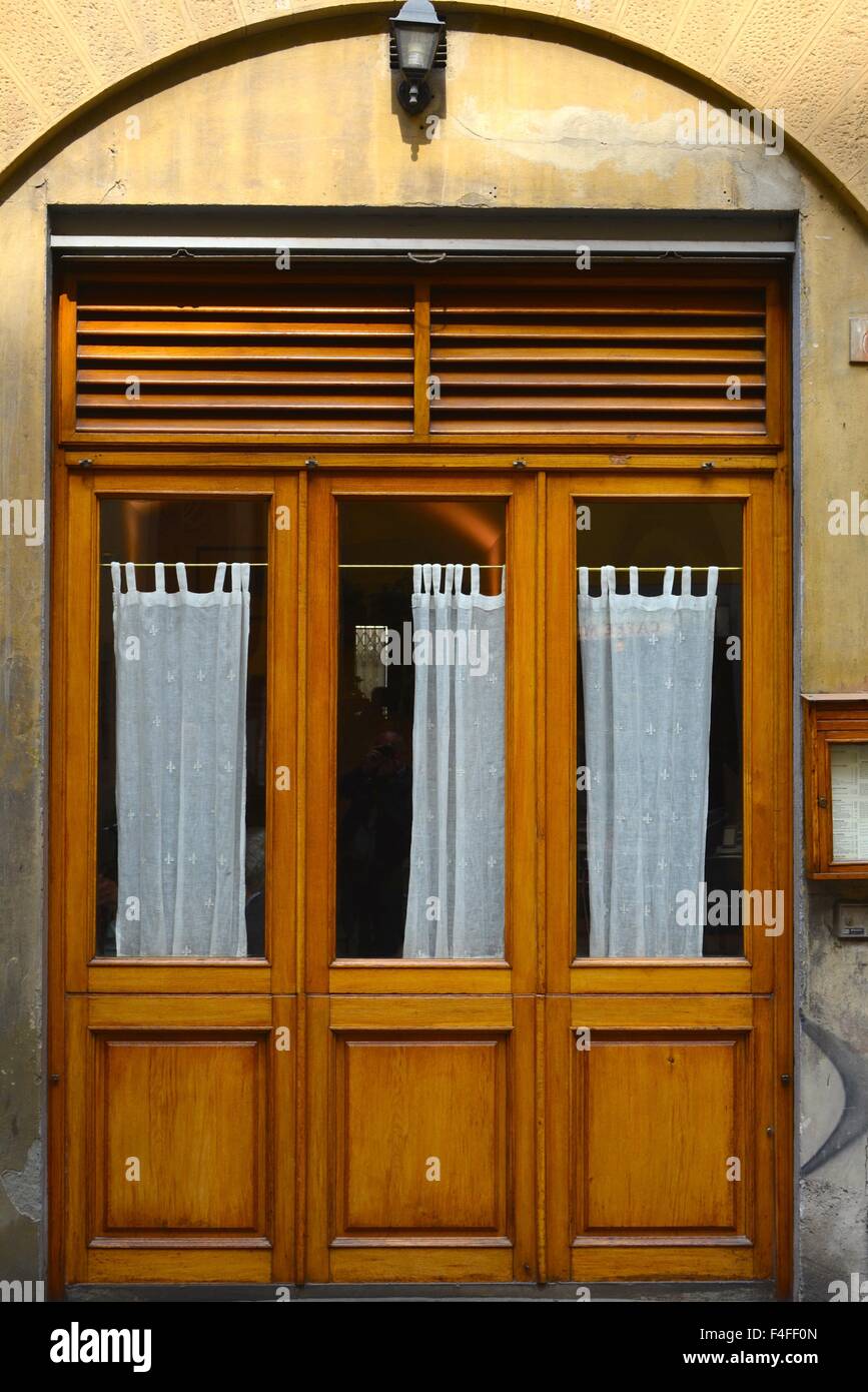 White curtains in the window of a restaurant in Florence, italy Stock ...