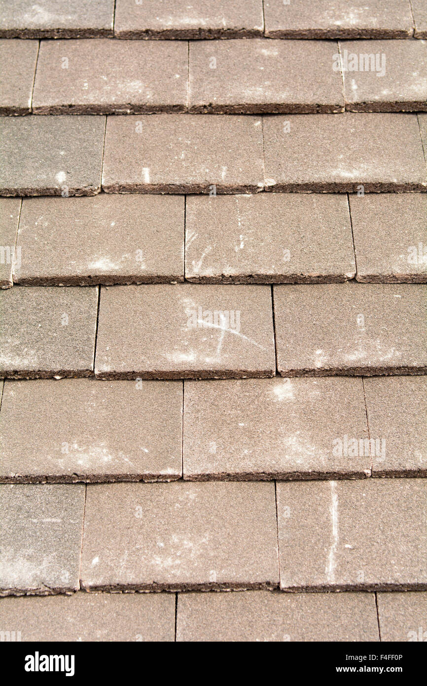 X mark on roof tiles to signify row of tiles to nail to wooden battens ...
