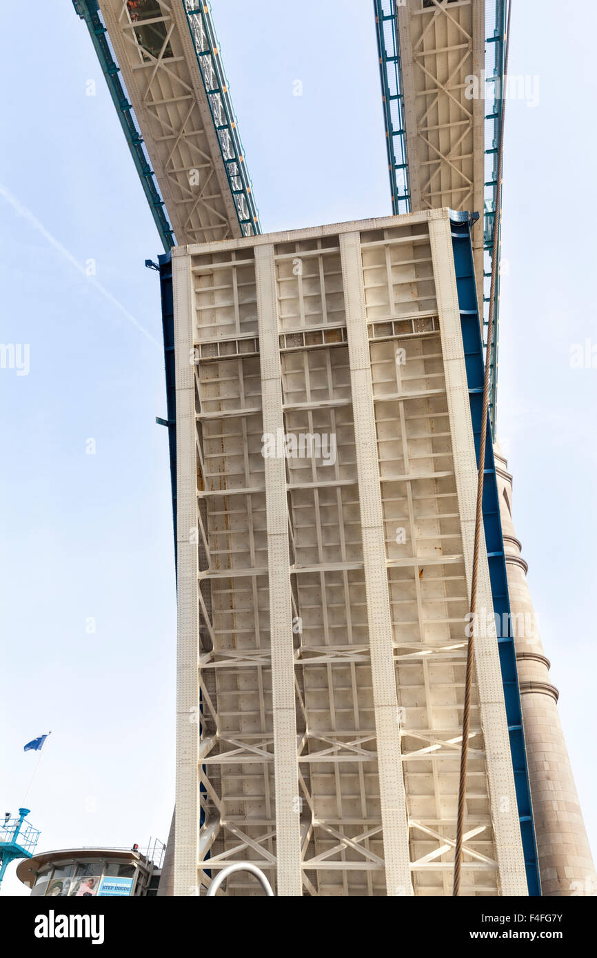 Tower Bridge open, low angle view of the drawbridge from the River ...