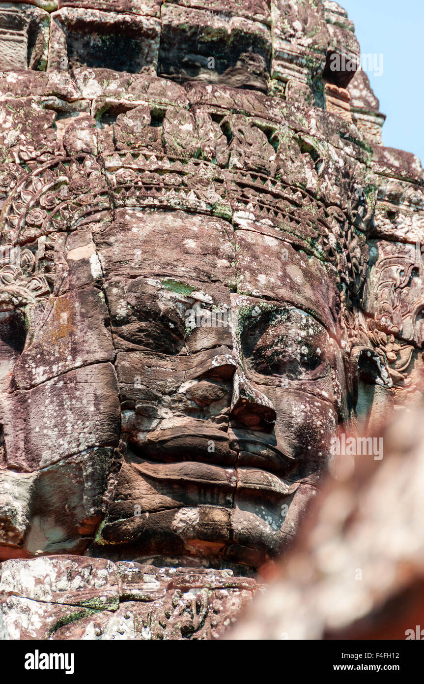 Head encarved in stone Bayon temple angkor Stock Photo - Alamy
