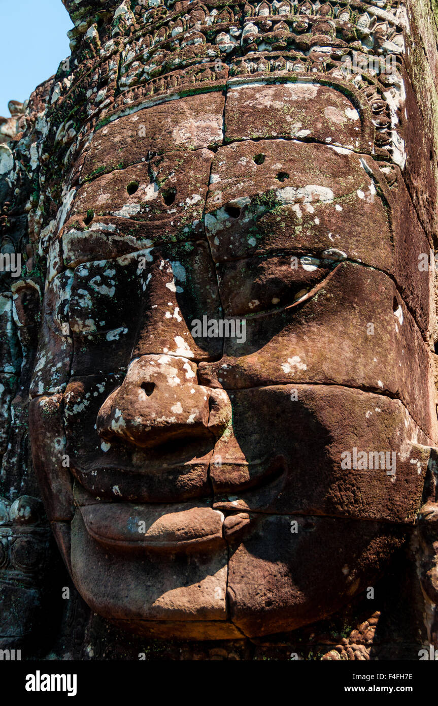 Head encarved in stone Bayon temple Angkor Stock Photo - Alamy