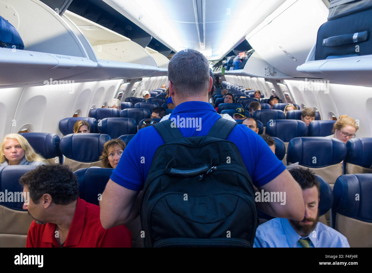 Packed plane cabin hi-res stock photography and images - Alamy