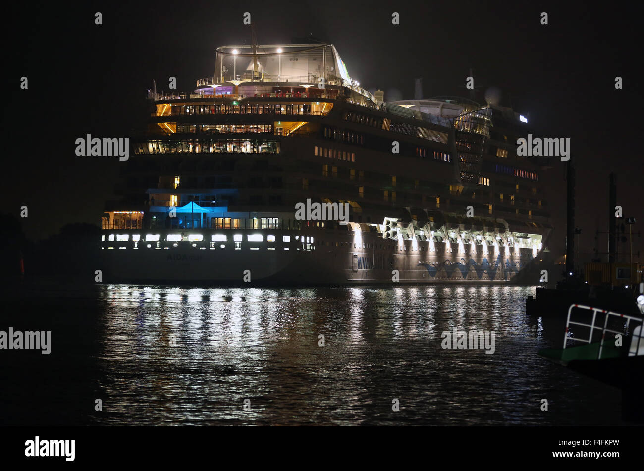 Rostock-Warnemuende, Germany. 17th Oct, 2015. The illuminated cruise ...