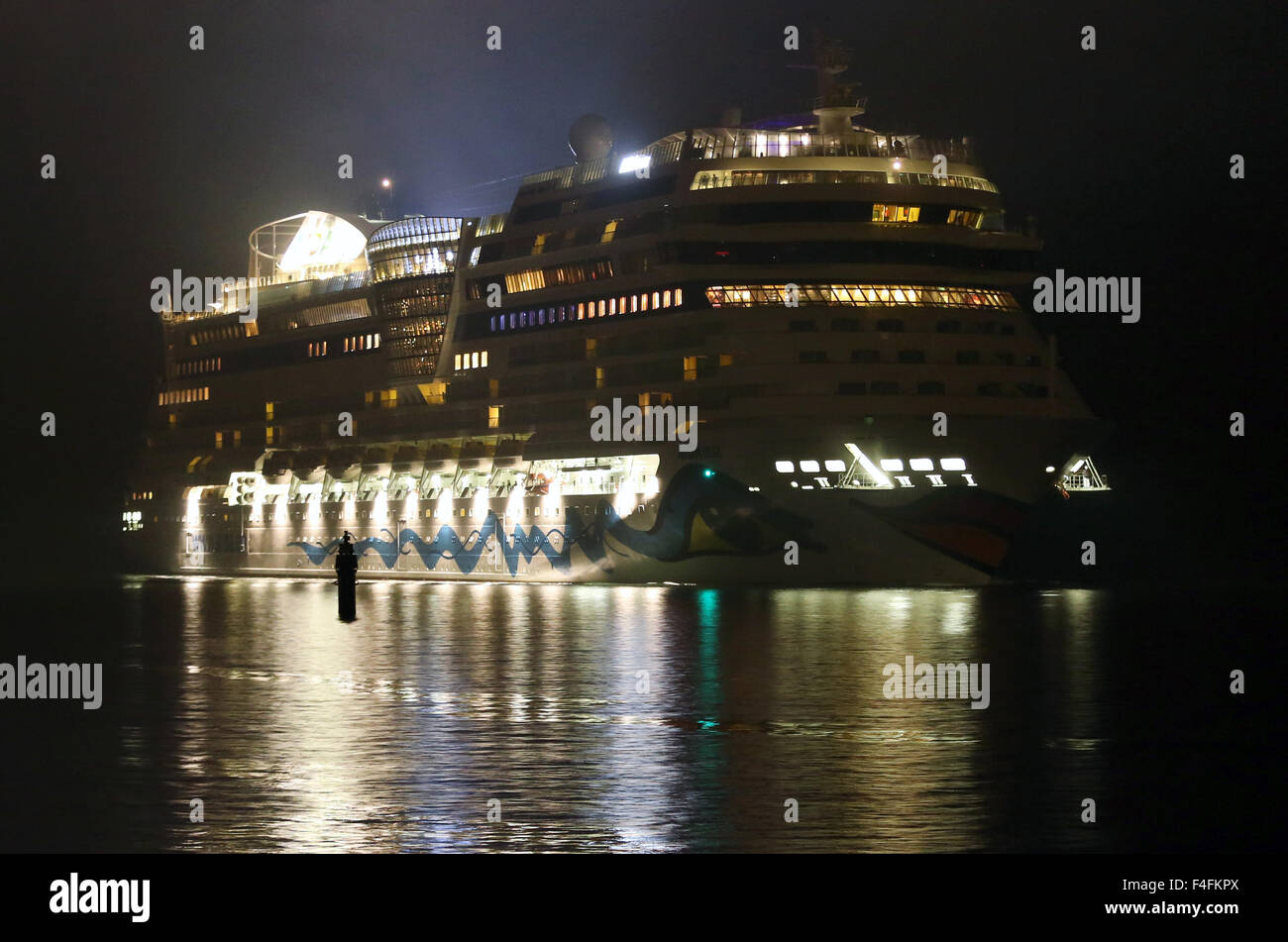Rostock-Warnemuende, Germany. 17th Oct, 2015. The illuminated cruise ...