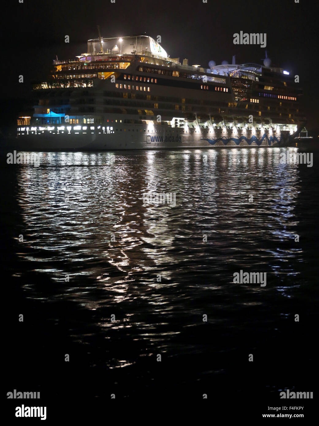 Rostock-Warnemuende, Germany. 17th Oct, 2015. The illuminated cruise ...