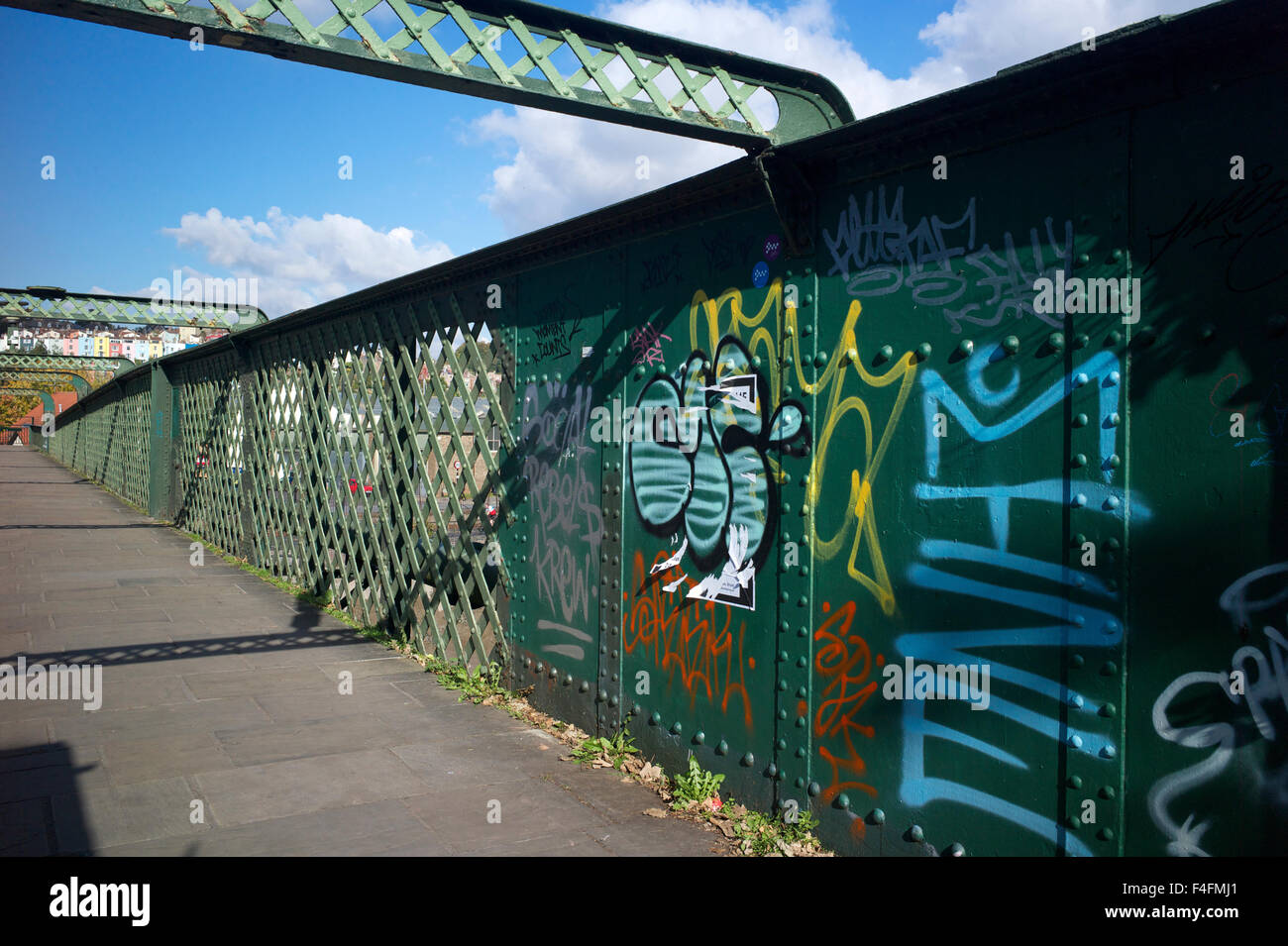 Graffiti on an iron pedestrian bridge, UK Stock Photo - Alamy