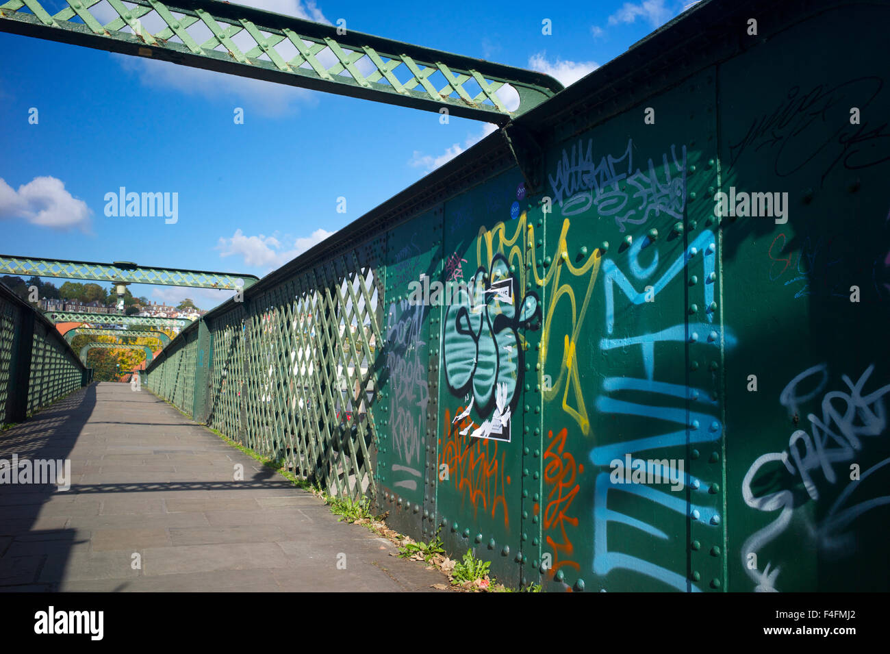 Graffiti on an iron pedestrian bridge,, UK Stock Photo - Alamy