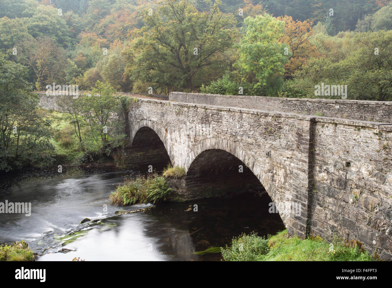Stone bridge with two arches, near Betwys-y-Coed, Snowdonia National ...