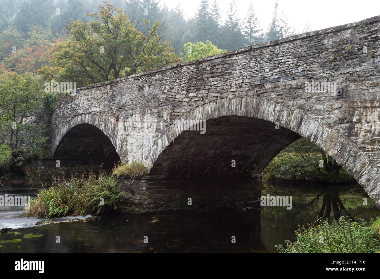 Stone bridge with two arches, near Betwys-y-Coed, Snowdonia National ...