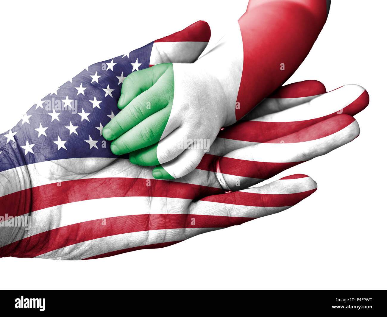 United States flag overlaid the hand of an adult man holding a baby ...
