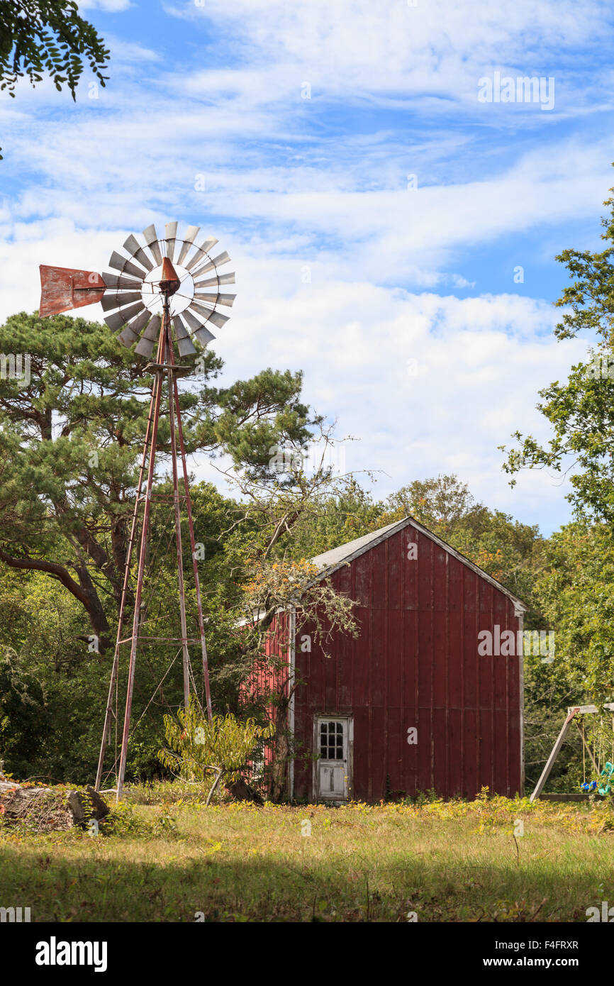 New England rustic barn in summer with a green grass lawn Stock Photo ...