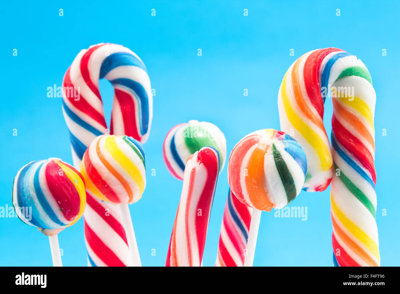Vintage lollipops on a blue background Stock Photo - Alamy