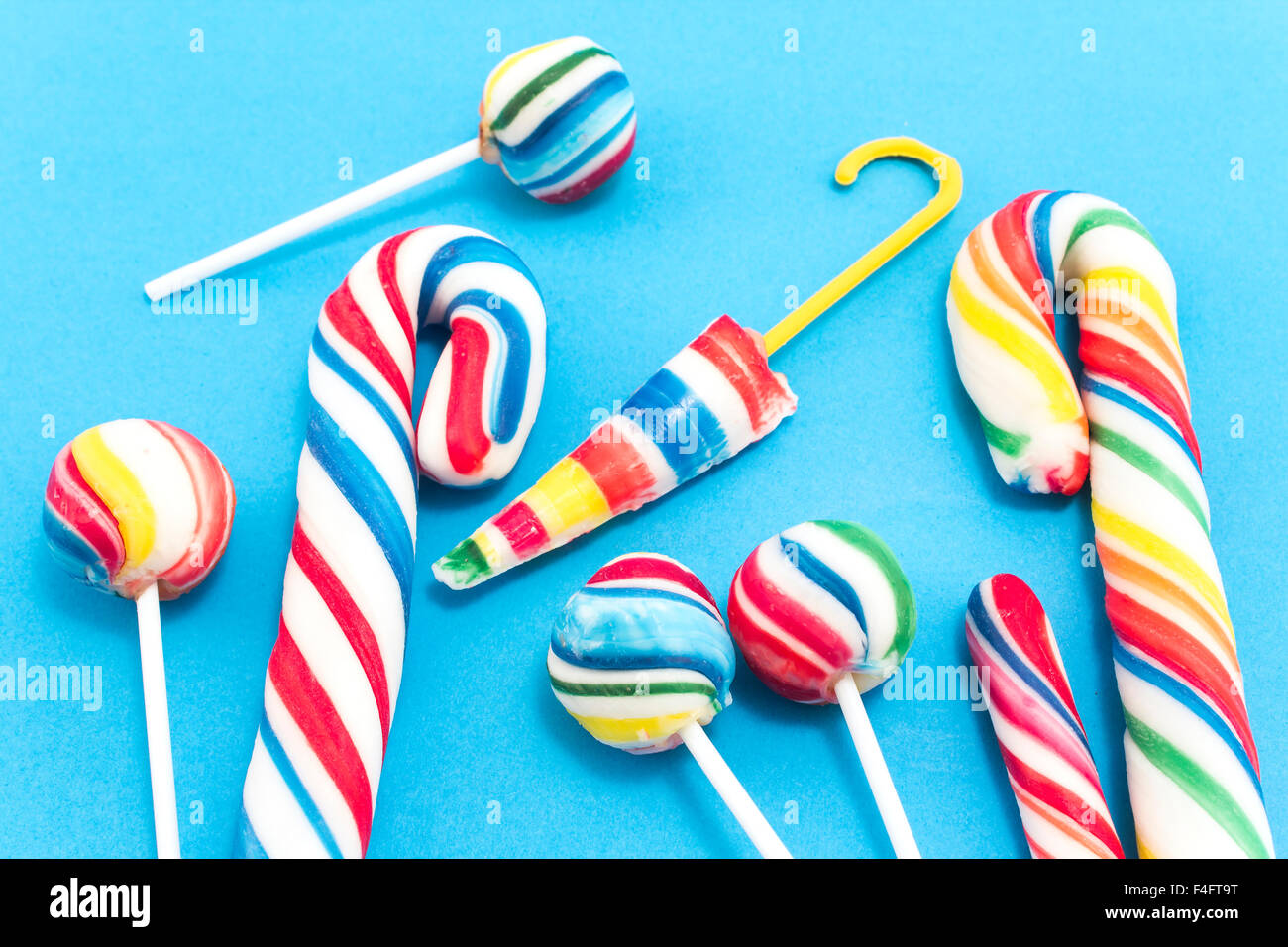 Vintage lollipops on a blue background Stock Photo - Alamy