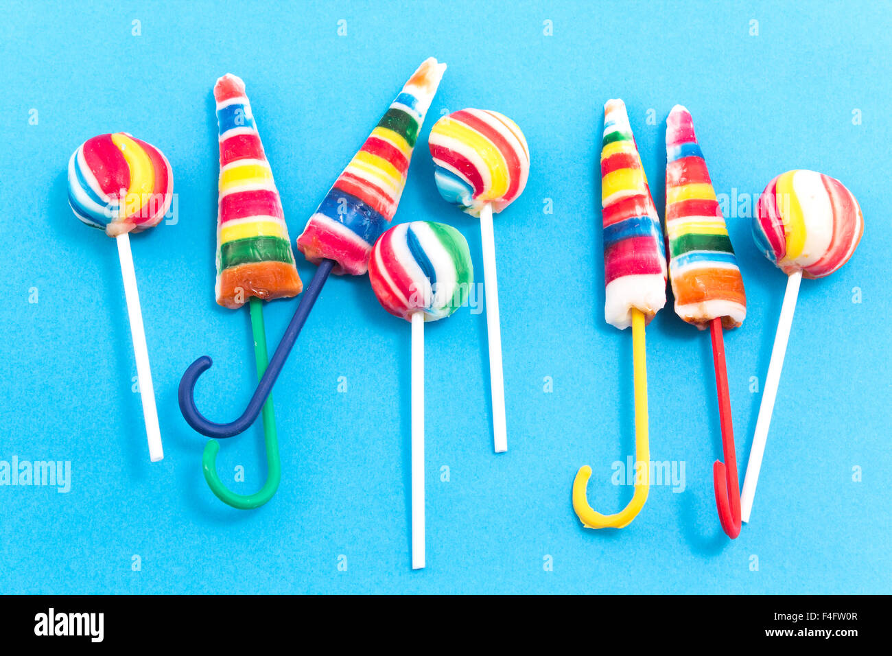 Vintage lollipops on a blue background Stock Photo - Alamy