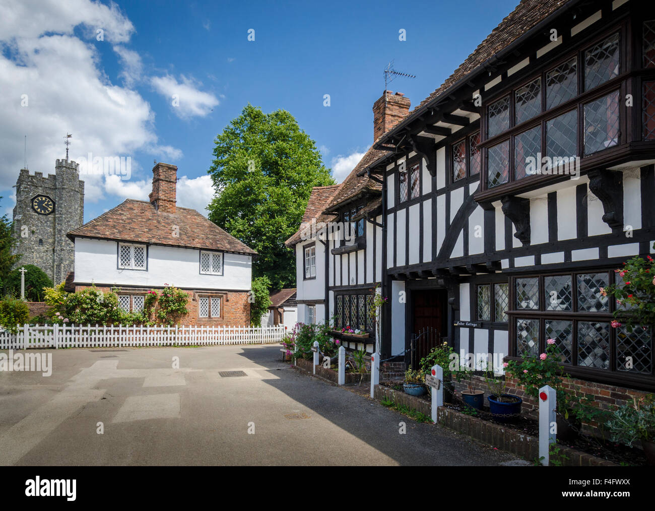 Tudor cottages and church tower in the village of Chilham, Kent, UK ...
