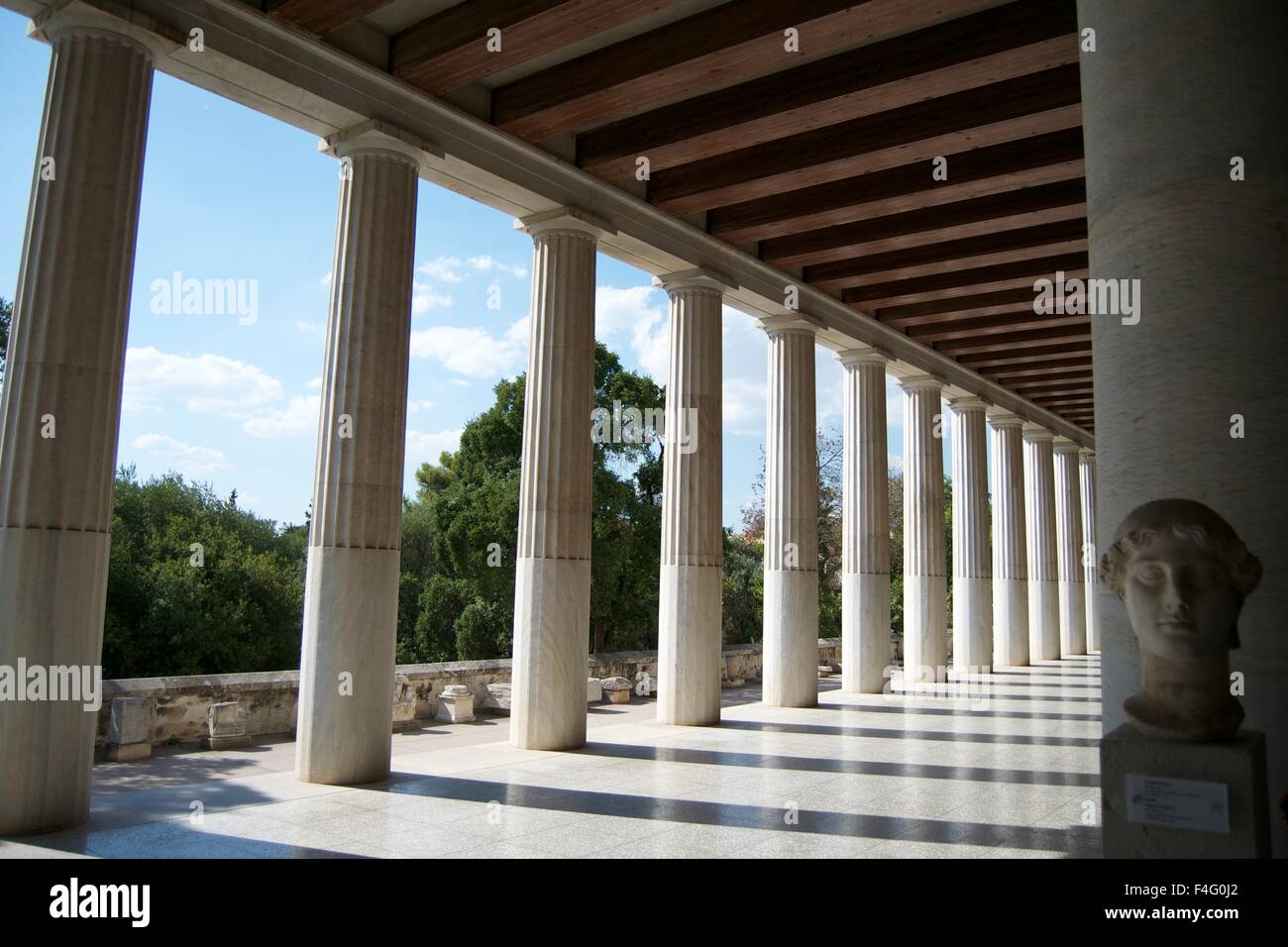 Corridor with Greek pillars Stock Photo - Alamy