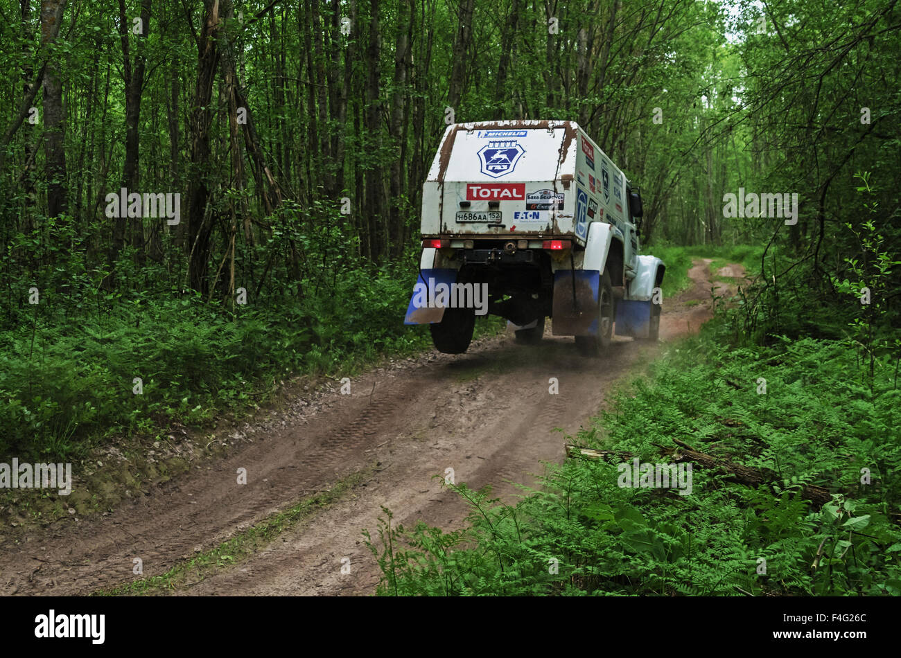 Races on a rally-raid in forest. Rally-raid Baha "Belarus" 2015 ...