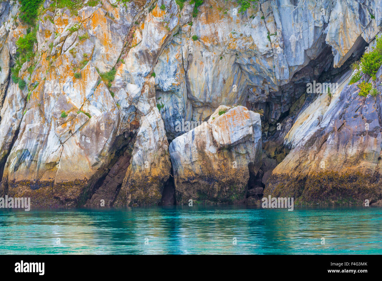 USA, Alaska, Glacier Bay National Park. Scenic of cliff and seawater ...
