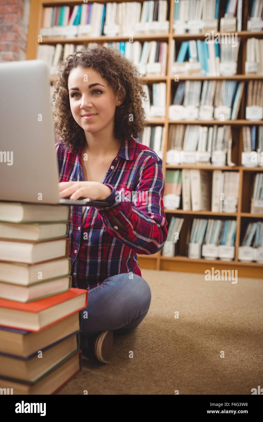 Student with books and computer hi-res stock photography and images - Alamy