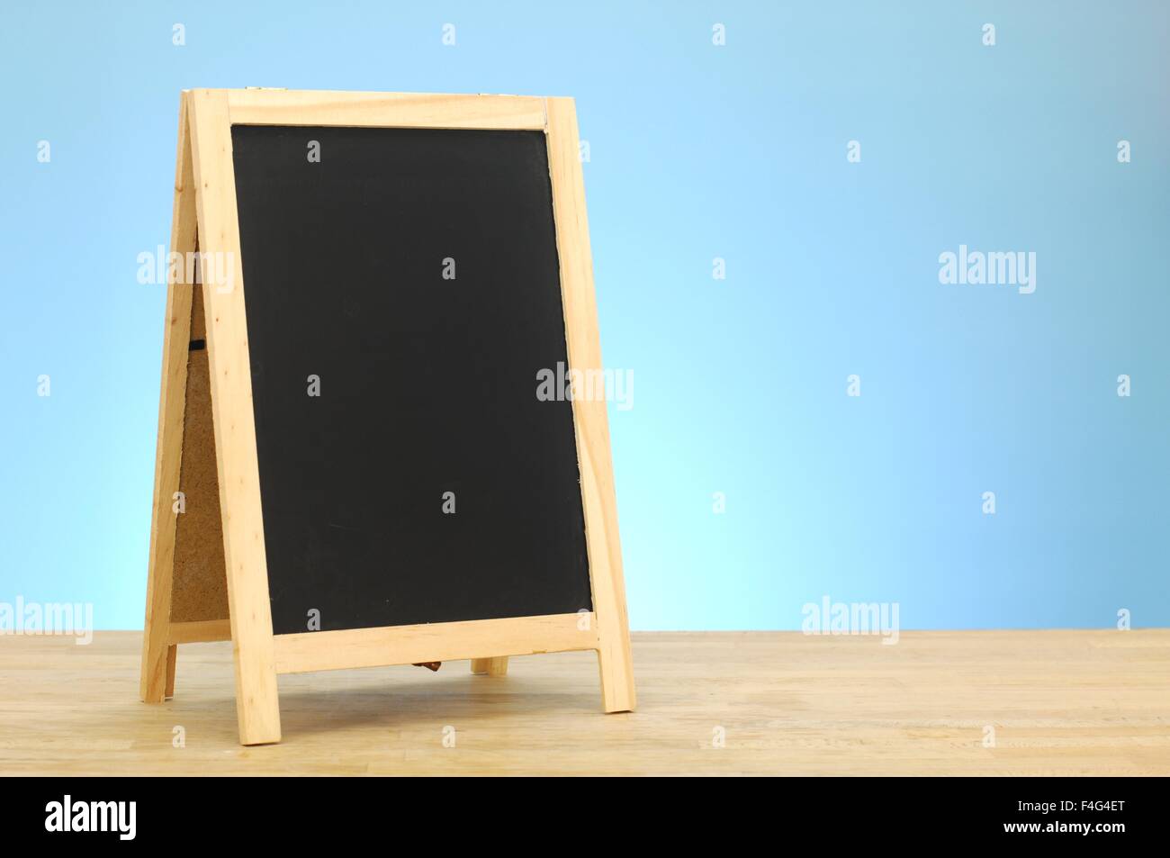 A close up shot of a portable blackboad sign Stock Photo - Alamy