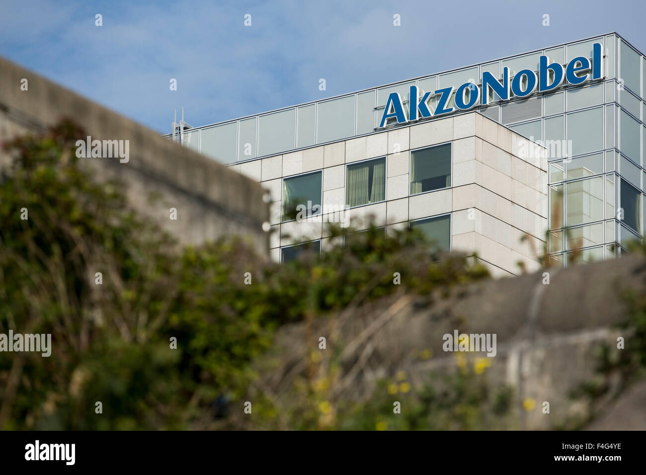A logo sign outside of the headquarters of AkzoNobel in Amsterdam ... A logo sign outside of the headquarters of AkzoNobel in Amsterdam ...