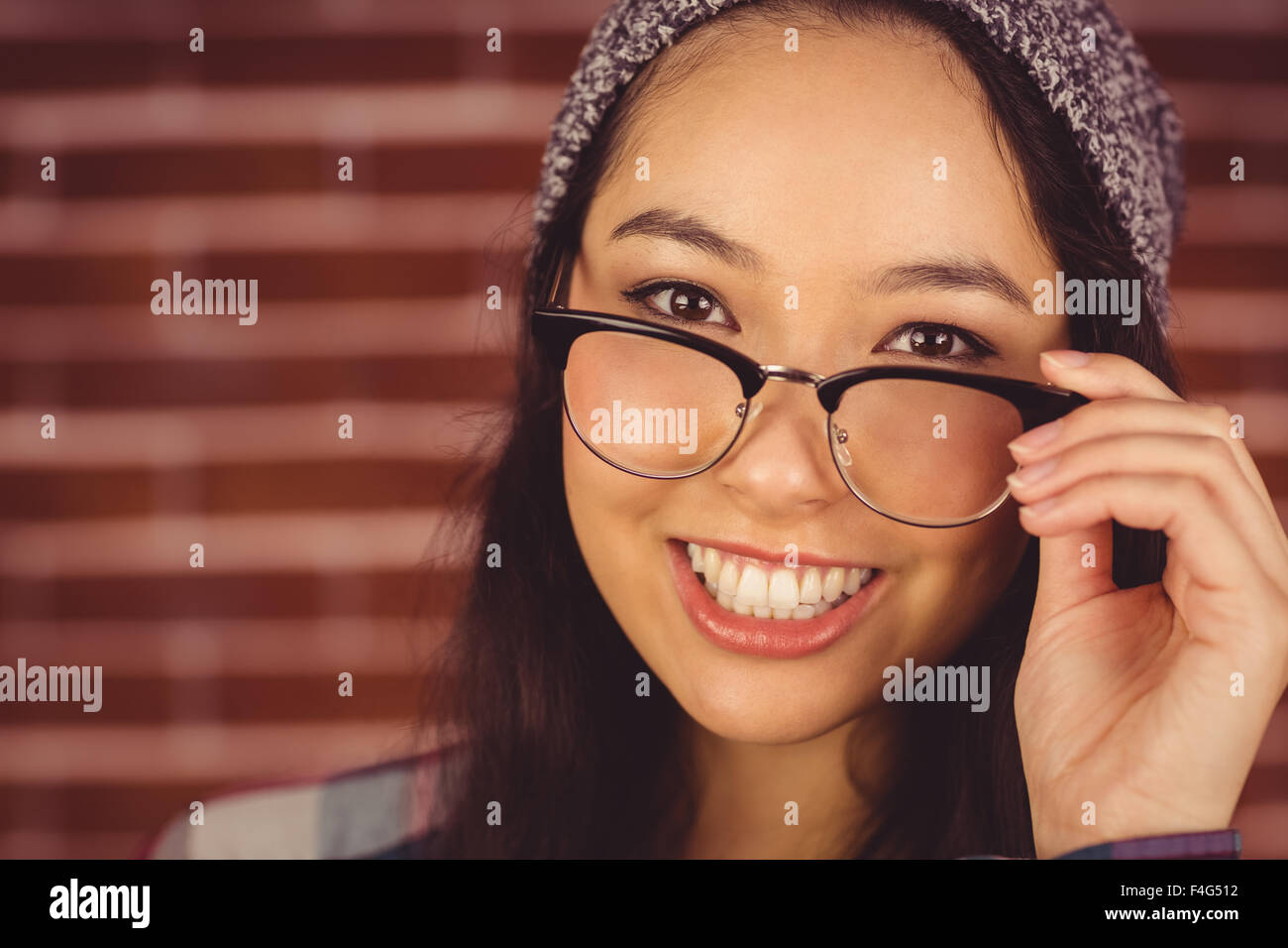 Attractive hipster posing at the camera Stock Photo - Alamy