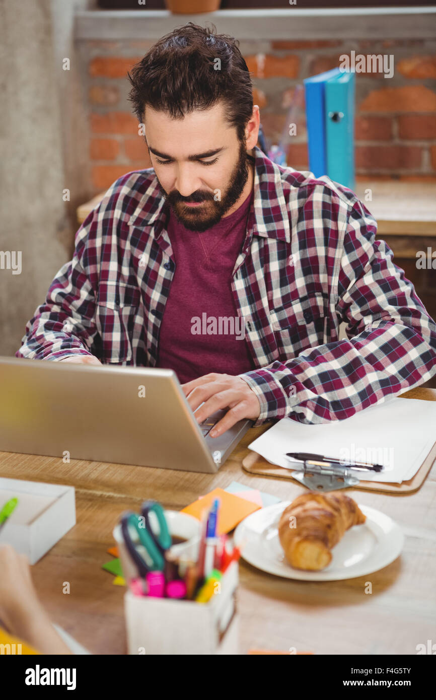 Beard young man working hi-res stock photography and images - Alamy